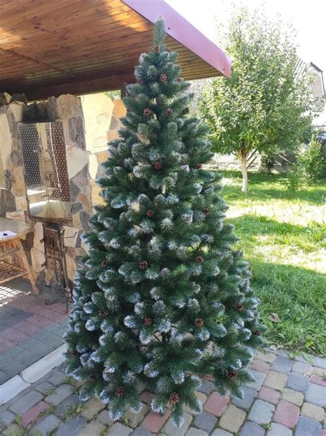 ᐉ Штучна ялинка Елітна з шишками та білими кінчиками з підставкою 2 00м 14 рядів Темно зелений