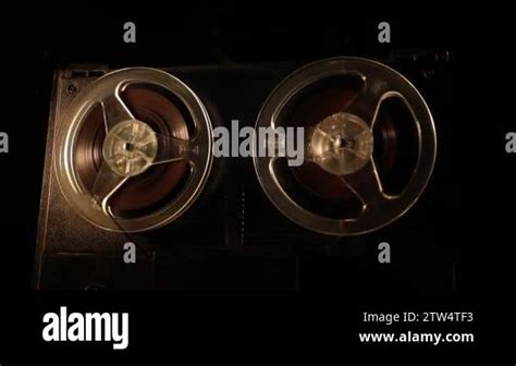 Old Vintage Reel To Reel Player And Recorder On Dark Toned Foggy