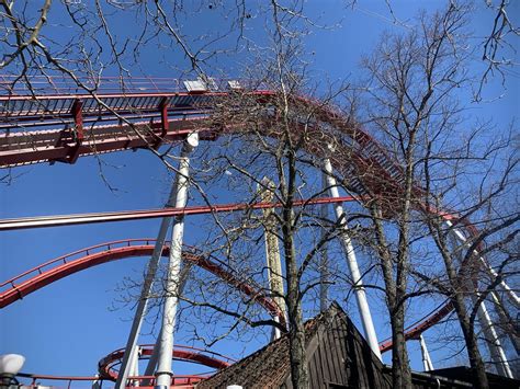 Daemonen Tivoli Gardens Photographed Along The Street With Buses Passing By And Public Trains