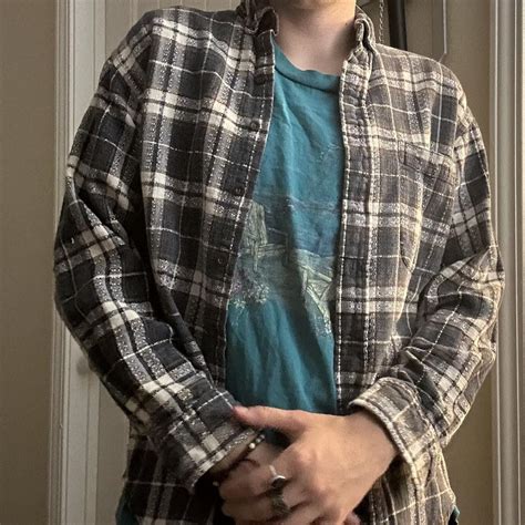medium flannel missing button on one of the arms i depop