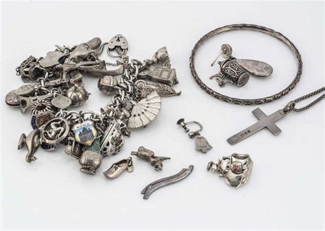 Lot 106 A Silver Charm Braclet