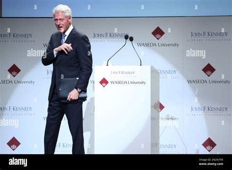 Former President Of The United States Bill Clinton Walks Away From The