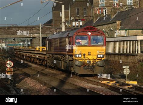 Class 66 Diesel Electric Loco 66059 Ews Livery Passing Through