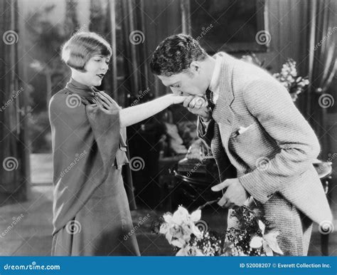 Man With Flowers Kissing Womans Hand Stock Image Image Of Adult