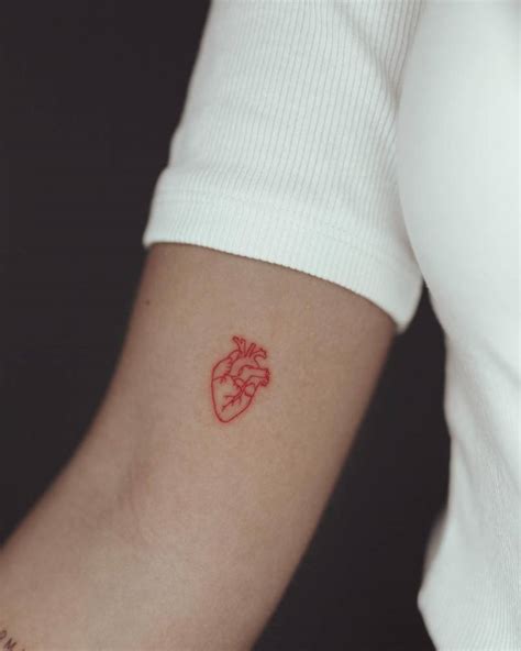 Minimalist Anatomical Red Heart Tattoo On The Inner