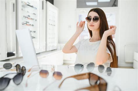 She Made Her Choice Beautiful Young Woman Adjusting Her New Sunglasses