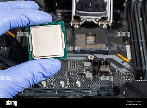 Plug In CPU Microprocessor To Motherboard Socket Technological Background Concept Computers