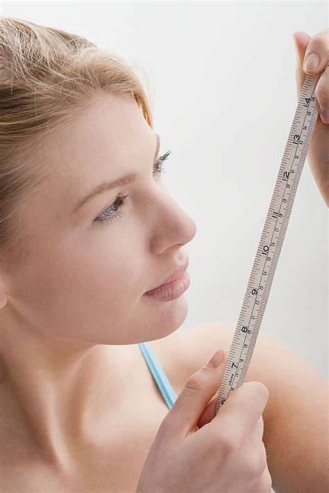 Woman With Tape Measure License Image 975582 Image Professionals