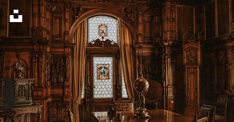 커다란 나무 테이블과 의자가 있는 식당 사진 Unsplash의 무료 건물 이미지