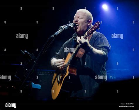 Singer And Guitarist Steve Mac Performing With His Band The Australian