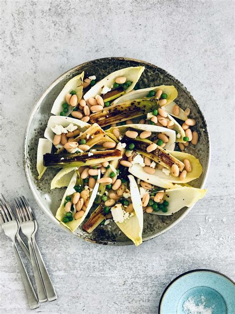 Charred Leeks Vinaigrette With Endive Peas And Cannellini Beans — Peter Som