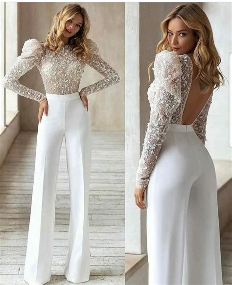 The Back Of A Womans White Dress With Long Sleeves And Lace Detailing