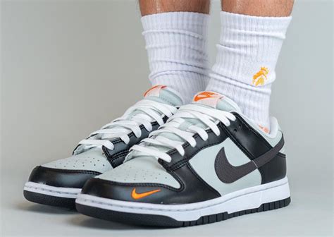 On Foot Look At The Nike Dunk Low Mini Swoosh Orange Panda Sneaker News
