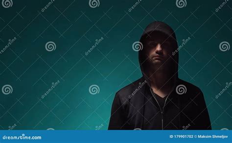 Portrait Of Computer Hacker In Hoodie Obscured Dark Face Data Thief Internet Fraud Darknet