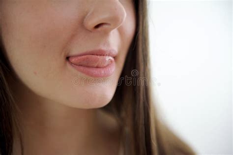 Lick Lips Close Up Mouth And Tongue Young Beautiful Girl On A White