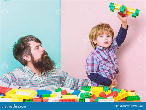 Father And Son Create Constructions Bearded Man And Son Play Together