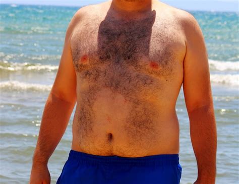 Cuerpo Extremadamente Peludo De Un Hombre Gordo En Fondo Marino Foto