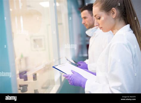 Lab Coats Clipboard Hi Res Stock Photography And Images Alamy