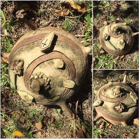 Huge Heavy Round Thing With Rose And Tiny Coffin On It Unearthed In A