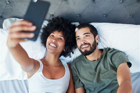Lets Make Love Go Viral A Young Couple Taking A Selfie While Lying In