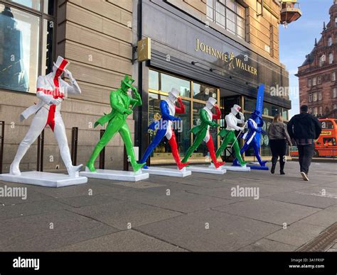Johnnie Walker Whisky Striding Man Statues In Six Nations Rugby Colours