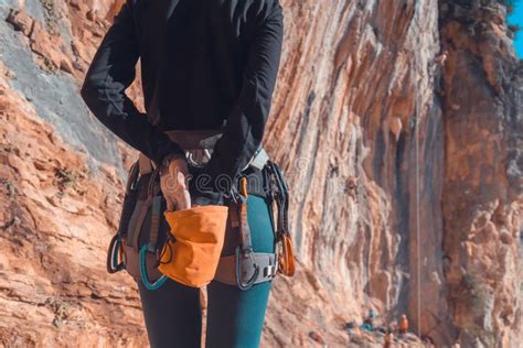Girl Is Climbing On The Red Rocks Leads An Active Lifestyle Stock