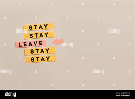 A Set Of Yellow Sticky Notes Present A Conceptual Decision Making Scenario With The Words Stay