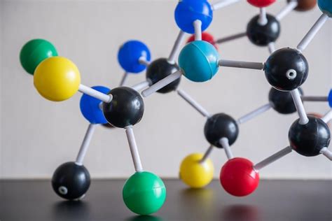 Premium Photo Close Up Of Colorful Molecule Models On Table