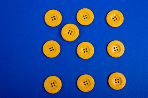 Premium Photo Close Up Of Buttons Against Blue Background