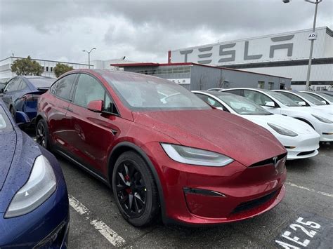 Teslas New Ultra Red Color Side By Side With Old Multicoat