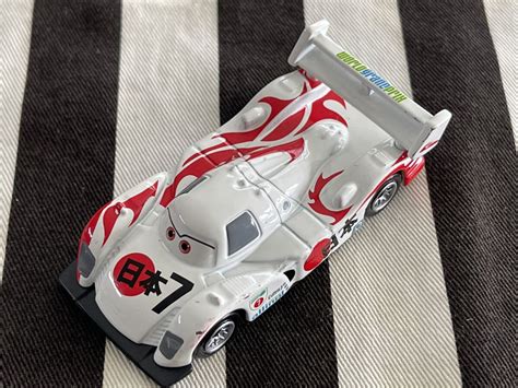 Yahooオークション 新品非売品カーズ トミカ ミニカー シュウトドロ