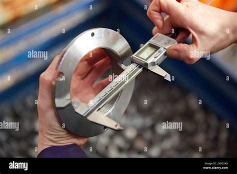 Worker Measuring With Caliper Area Automated Cnc Lathes Machined