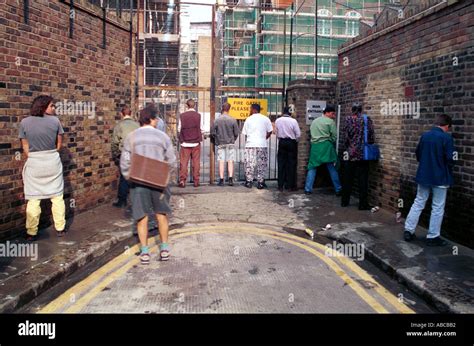 Group Pissing In Open Air Notting Hill Gate London England Britain Uk