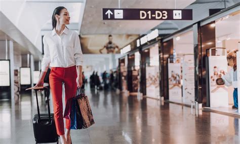 Protect Valuables While Traveling Woman At Airport HoopLA