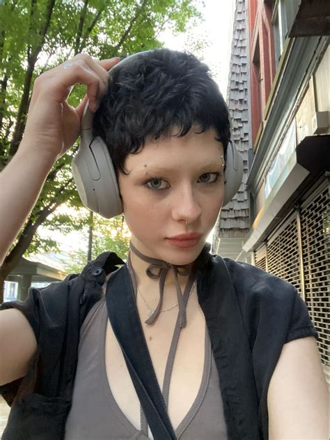 Dark Hair With Bleached Brows And Double Eyebrow Piercing