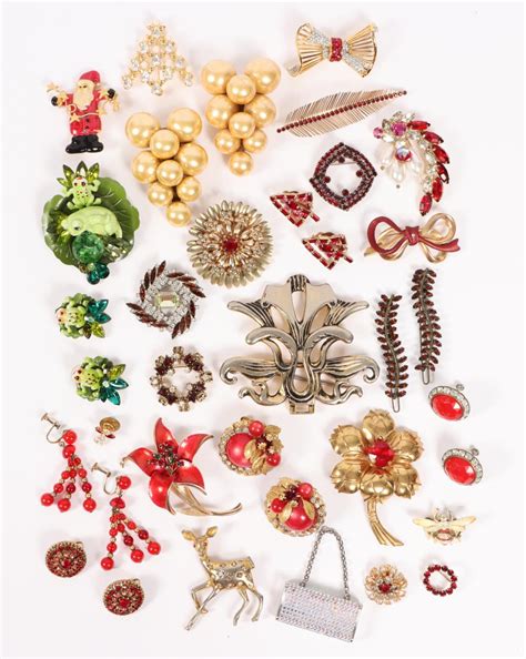 Lot - Vintage costume jewelry and accessory group including: D'orlan ...