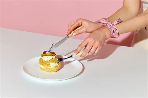 Cropped Shot Of Model Female Bound Hands With Measuring Tape Taking