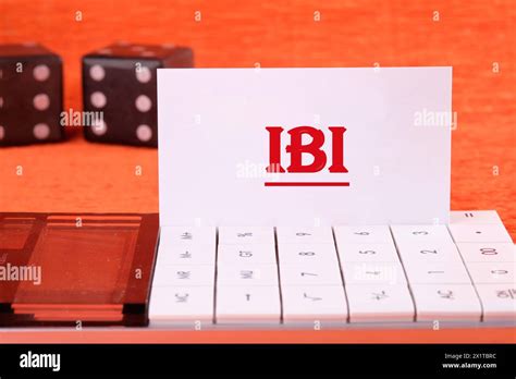 Ibi Symbol On A White Business Card On A Calculator On An Orange