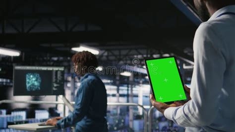 Data Center Engineers On Industrial Platform Using Isolated Screen Device Stock Video Video Of