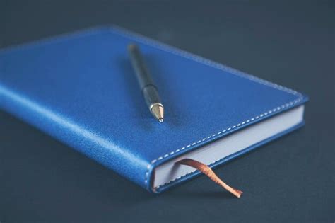 Premium Photo Pen On Notepad