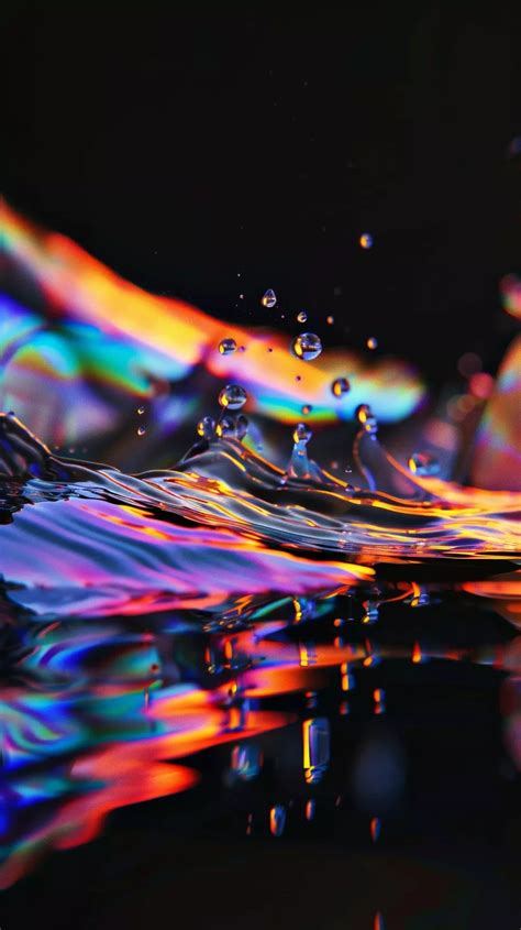 Across A Liquid Mirror Of Absolute Darkness Rippling Droplets Seem To