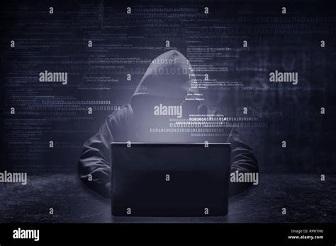 Internet Crime Concept Hacker Working On A Code On Dark Digital Background With Digital