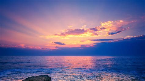 Light Purple Sky Above Beach Rock 4k Hd Nature Wallpapers Hd Wallpapers Id 44900