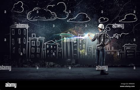 Rear View Of Engineer Woman Drawing Construction Plan Stock Photo Alamy