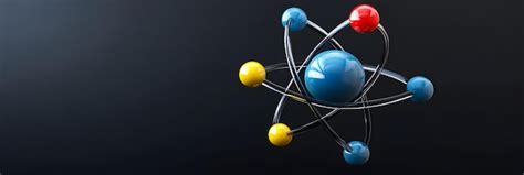 3d Model Of An Atom With Colorful Electrons Premium Ai Generated Image