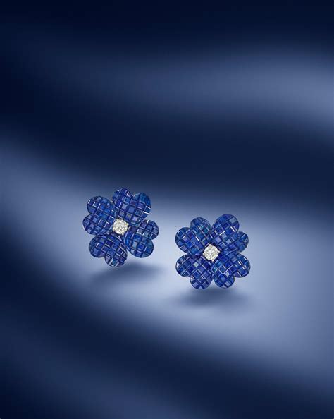 Bonhams A Pair Of Mystery Set Sapphire Cosmos Earclips By Van