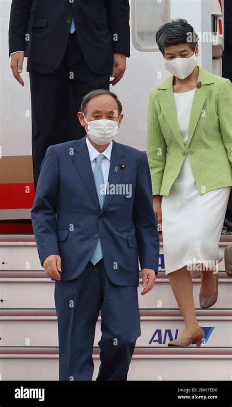 Japanese Prime Minister Yoshihide Suga And His Wife Mariko Arrive At