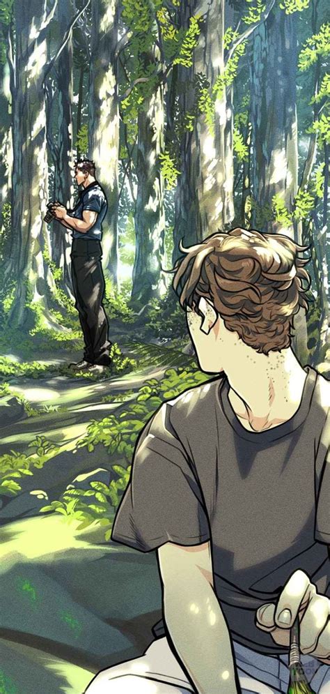Two People In The Woods With One Holding A Cell Phone And Another