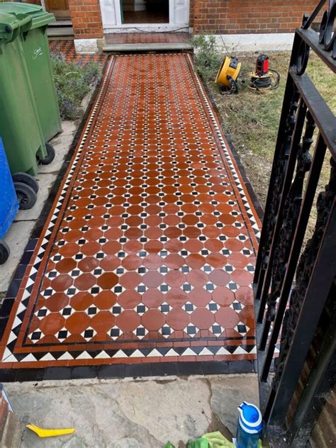 Dilapidated Red And Black Victorian Tiled Path Restored In Lewisham