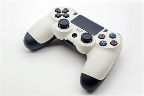 Sleek Modern Gaming Controller With A Blend Of Colors Isolated On A Clean White Backdrop
